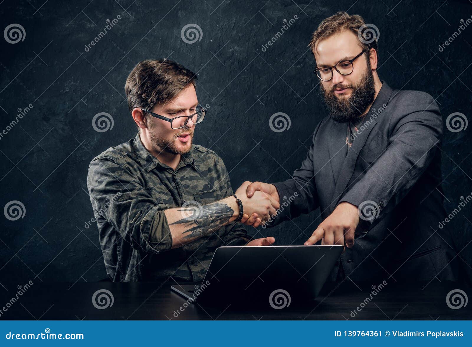 Two Programmer`s Colleagues Shake Hands after Completion of the General ...