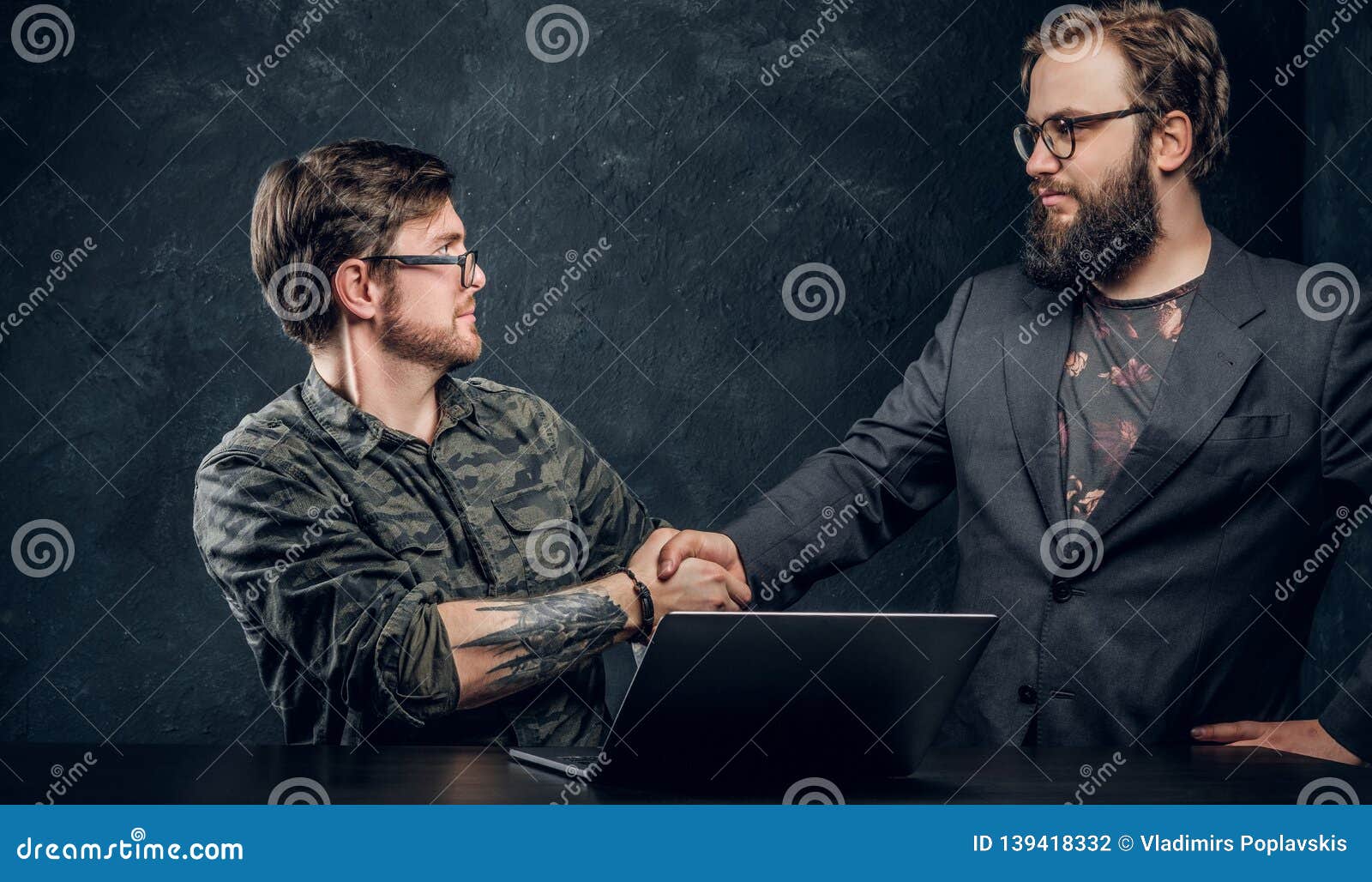 Two Programmer`s Colleagues Shake Hands after Completion of the General ...