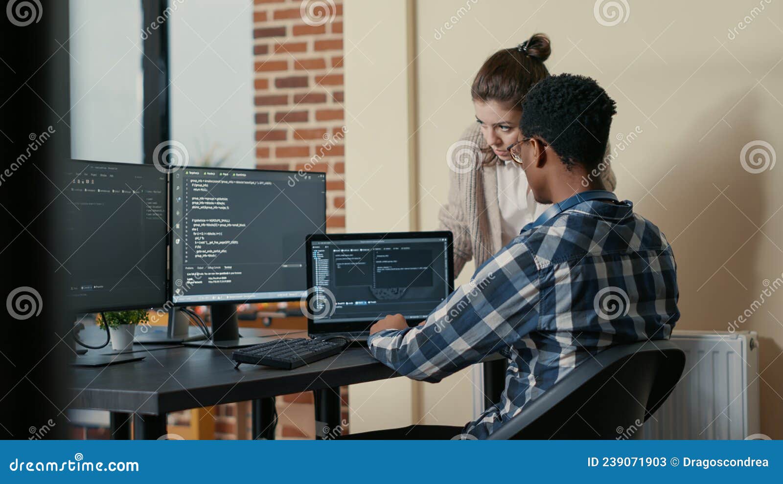 Two Programmers Doing High Five Hand Gesture at Desk with Multiple ...
