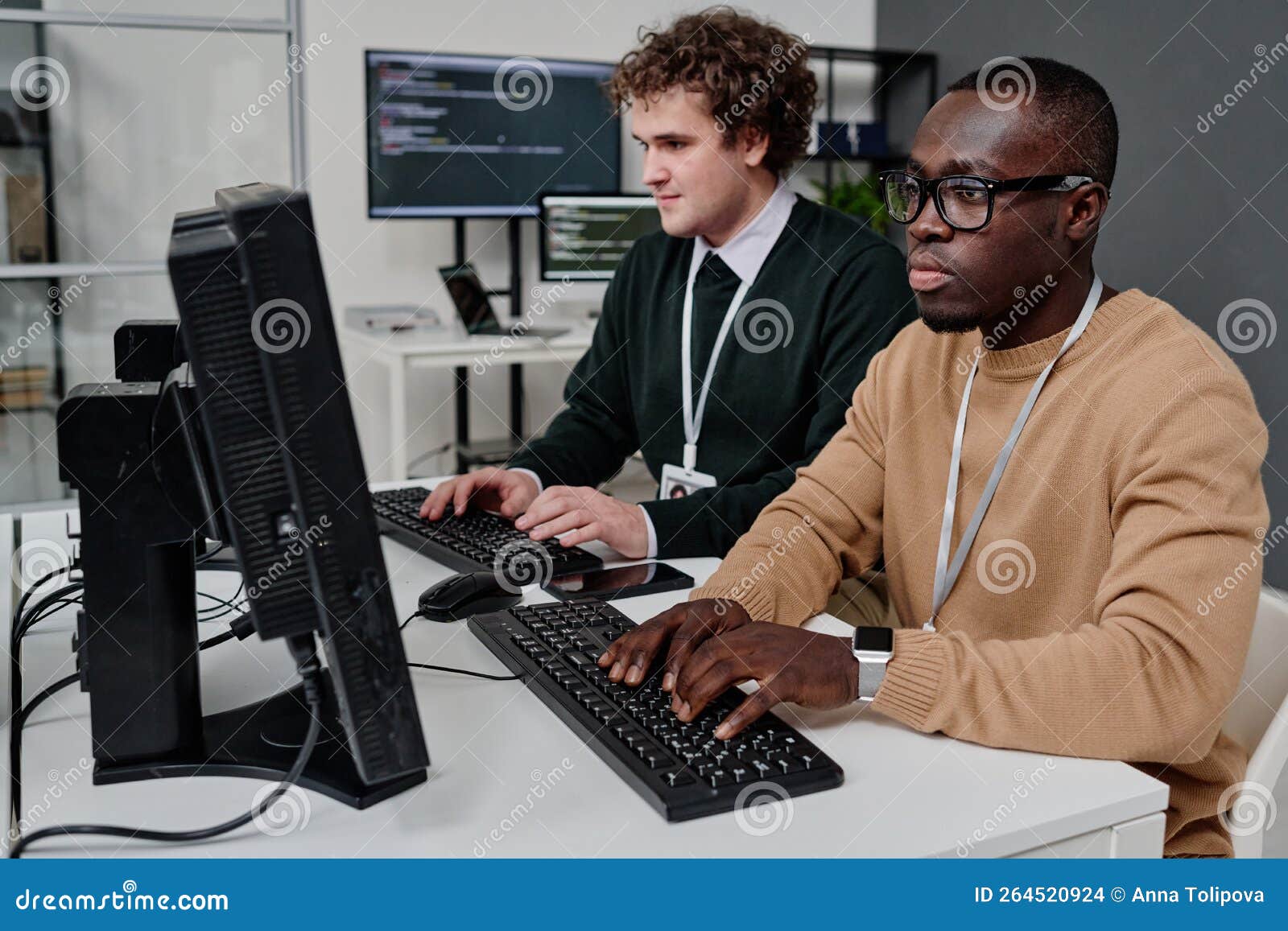 Two Programmers Writing Security Code on Computers Stock Photo - Image ...