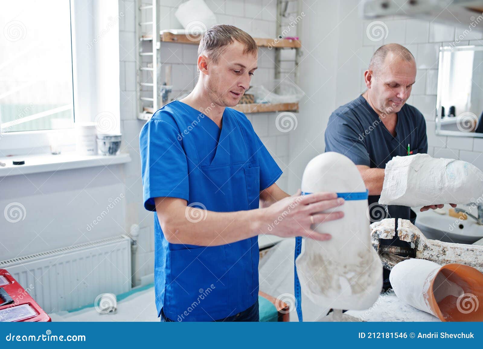 Prosthetist man worker stock photo. Image of medic, holding - 212181546