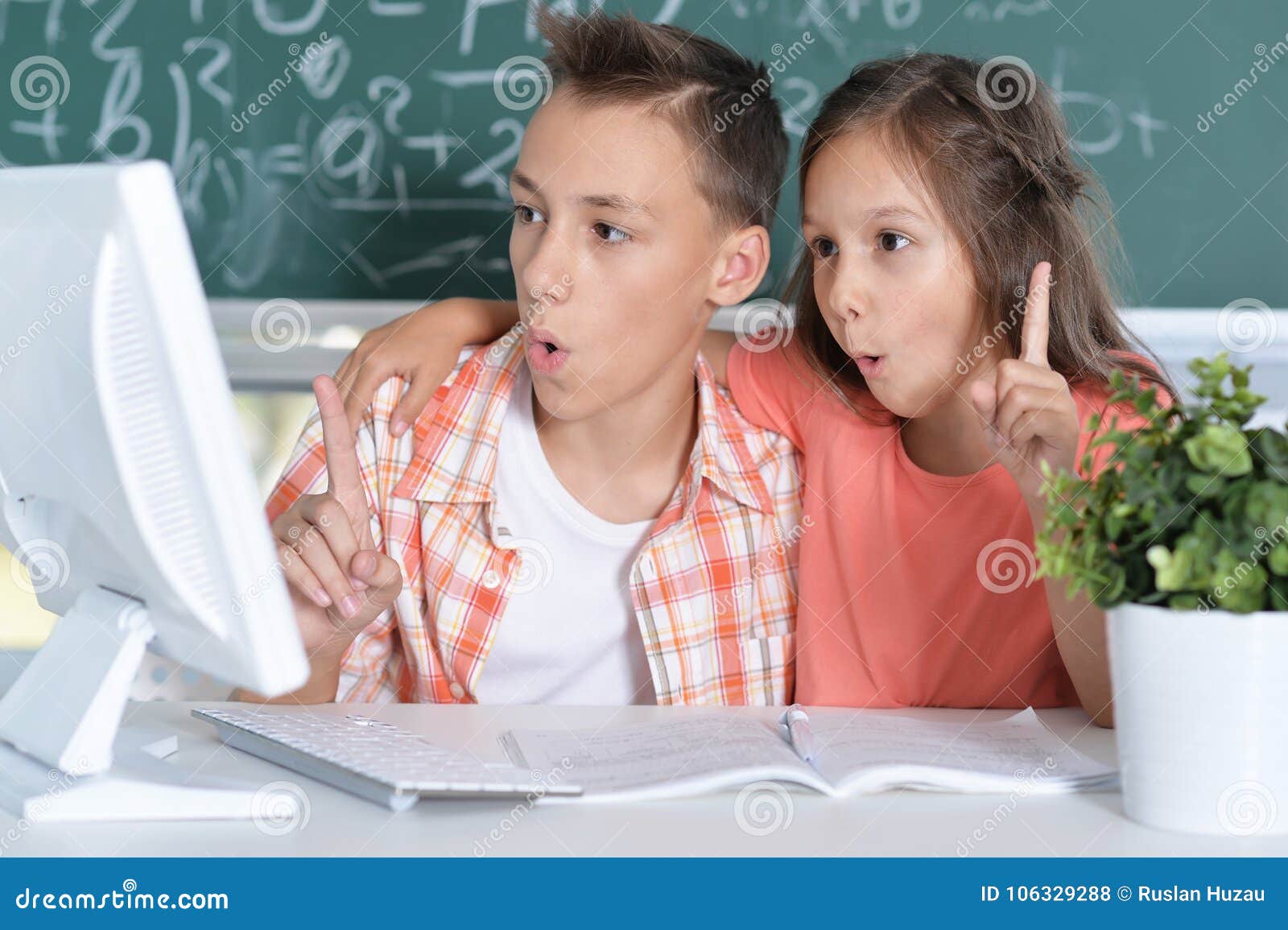Two Pupils Working Together Stock Photo - Image of software ...