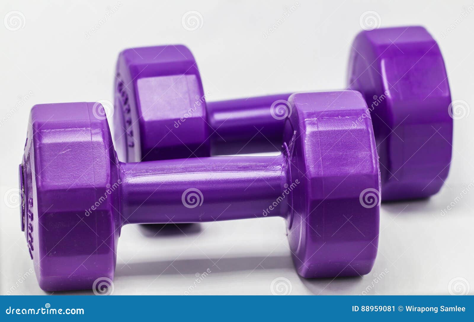 Two Purple Dumbbells Plastic Stock Image - Image of lifting, isolate ...