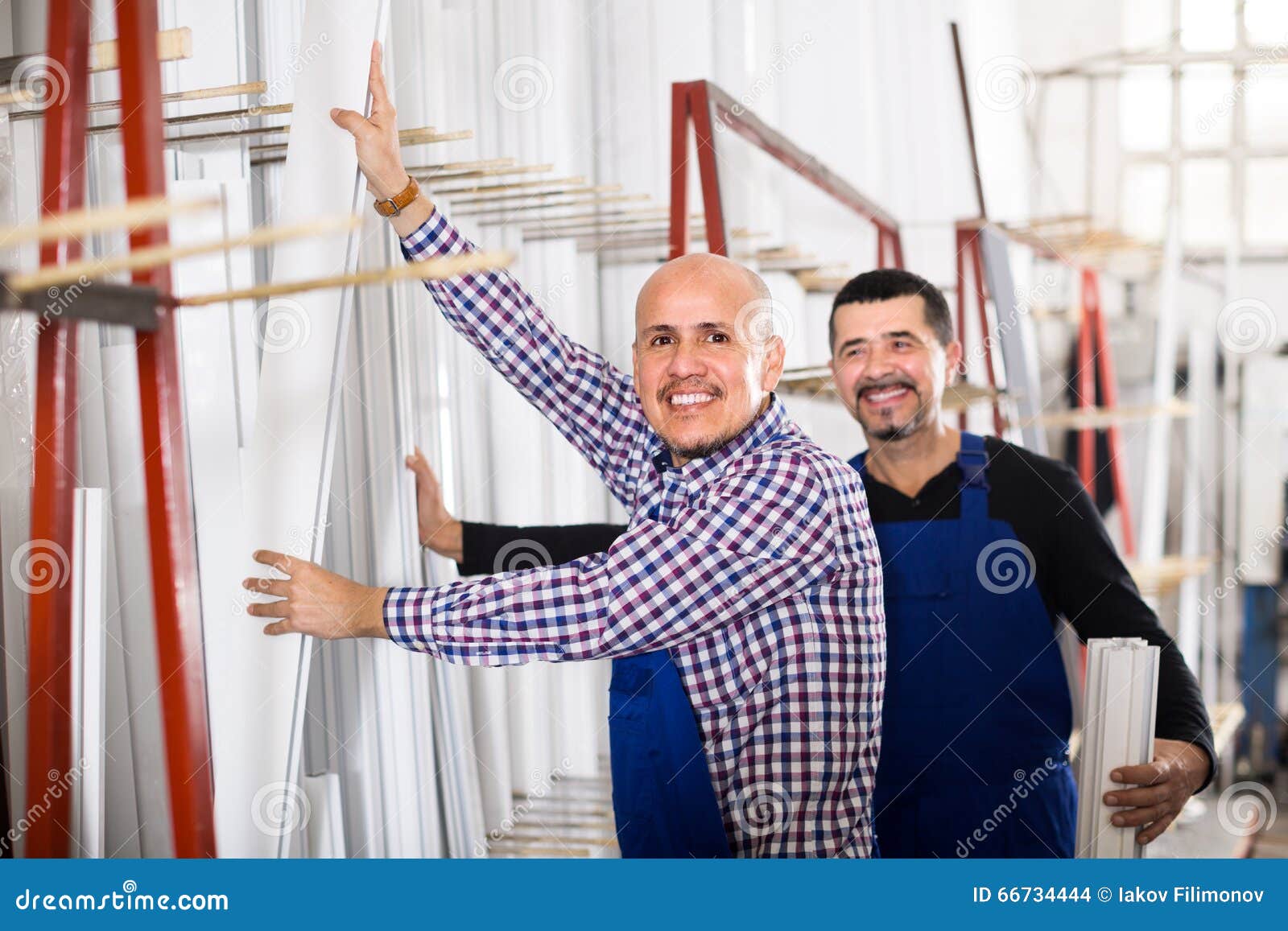 Two PVC Industry Workers in Coveralls Stock Photo - Image of production ...
