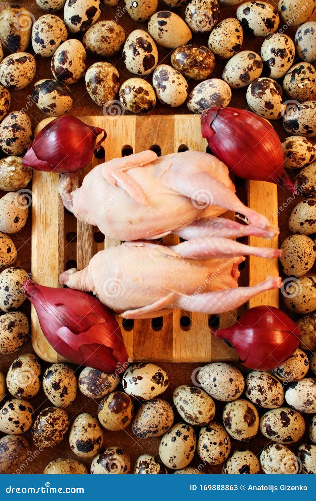 Two Quail Carcasses on the Board and Many Small Eggs Stock Image ...