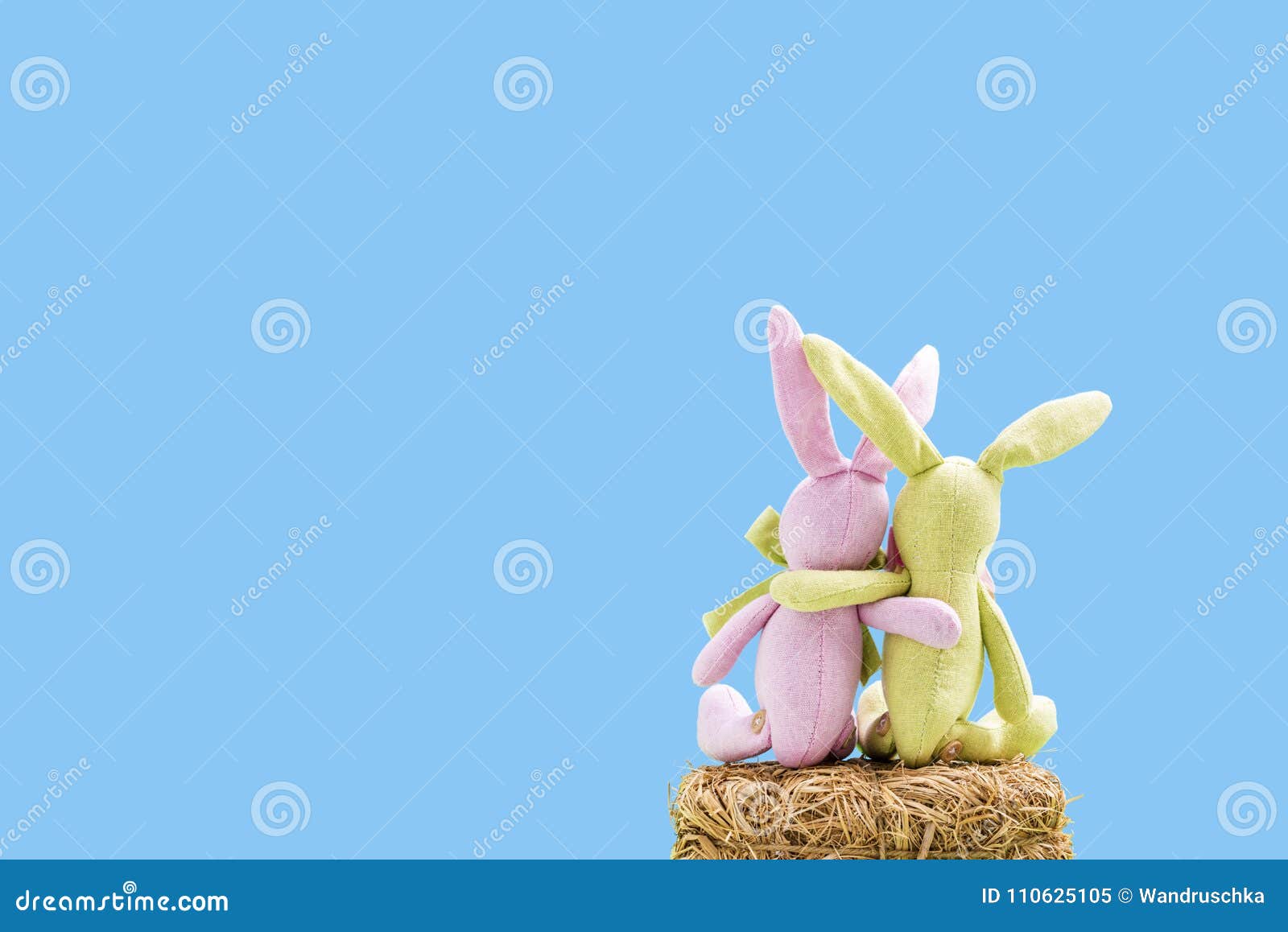Two Rabbits on a Straw Bale Stock Image - Image of easter, animal ...