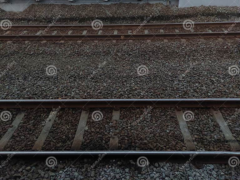 Two Railroads on Pebbles Surface at Train Station Stock Photo - Image ...