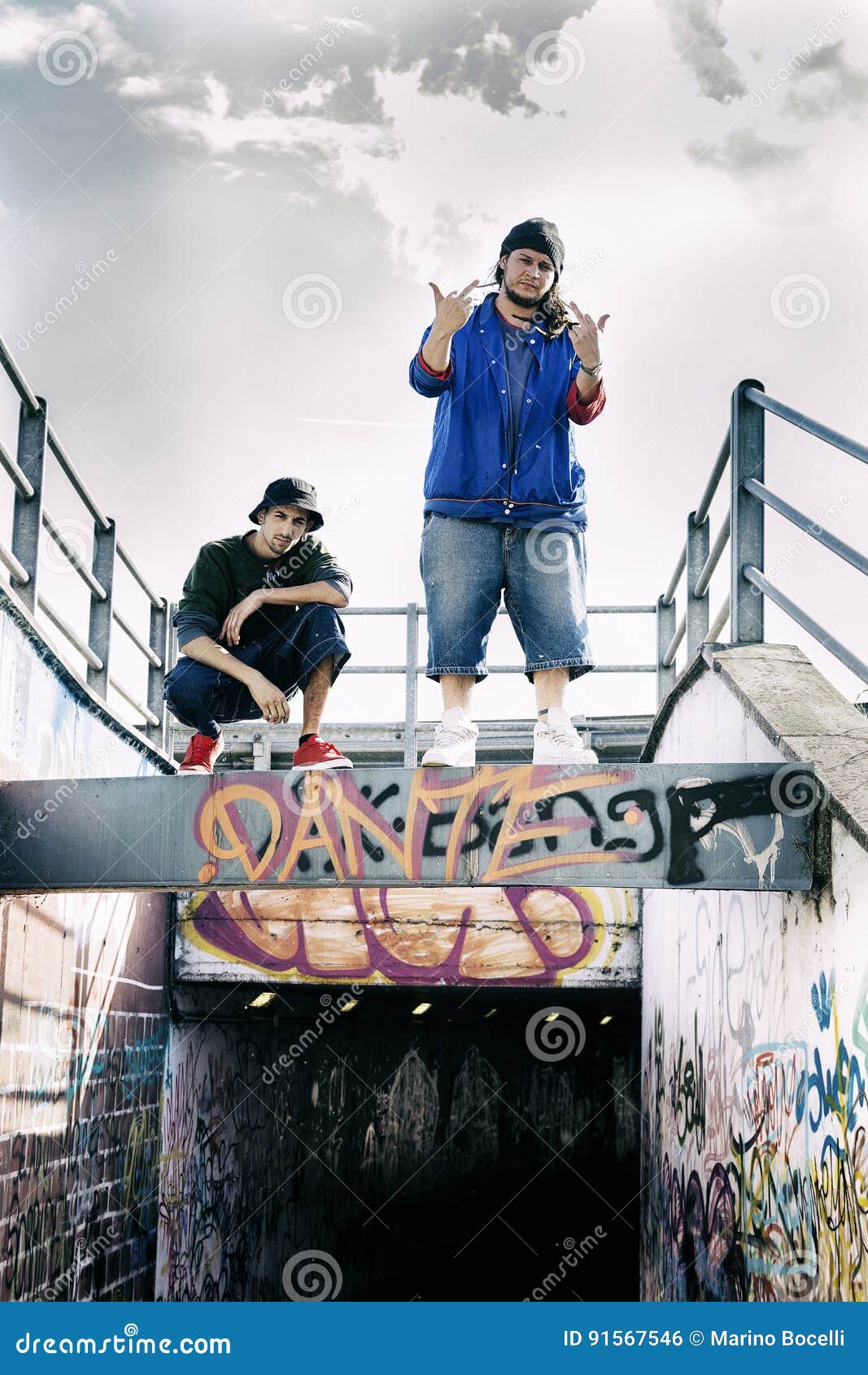 Two Rap Singers on a Concrete Beam Stock Photo - Image of crime ...
