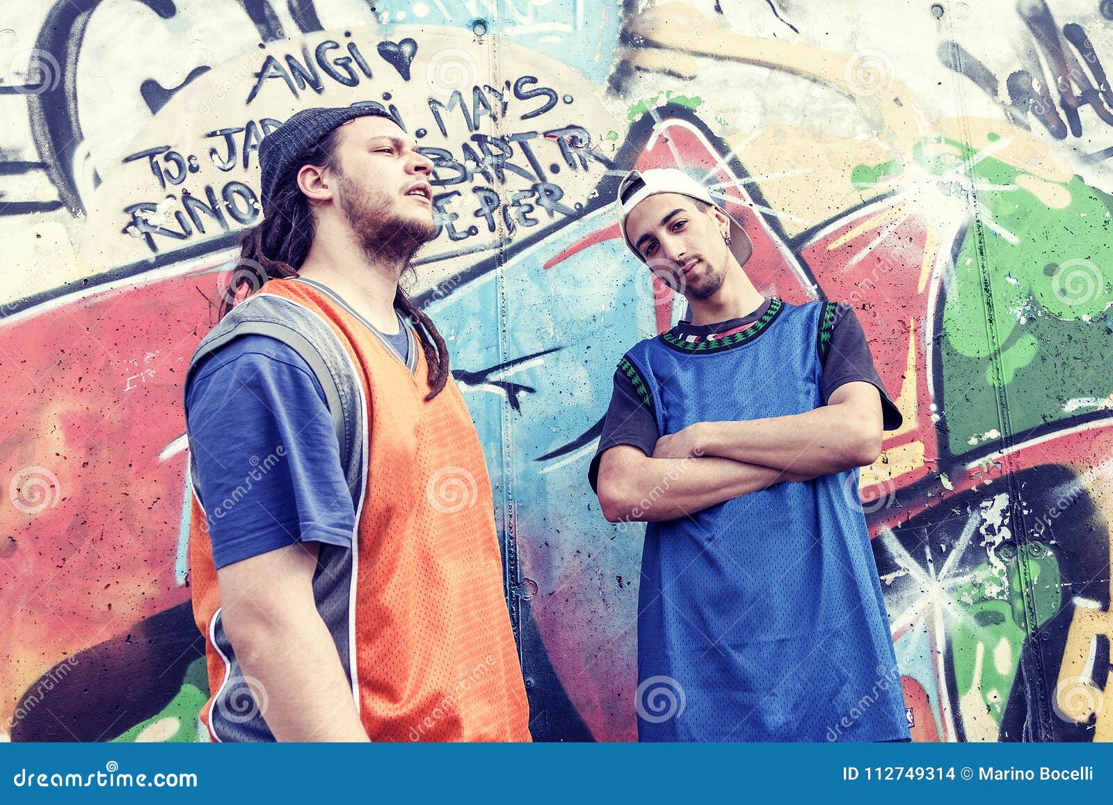 Two Rap Singers in a Subway with Graffiti in the Background Stock Photo ...