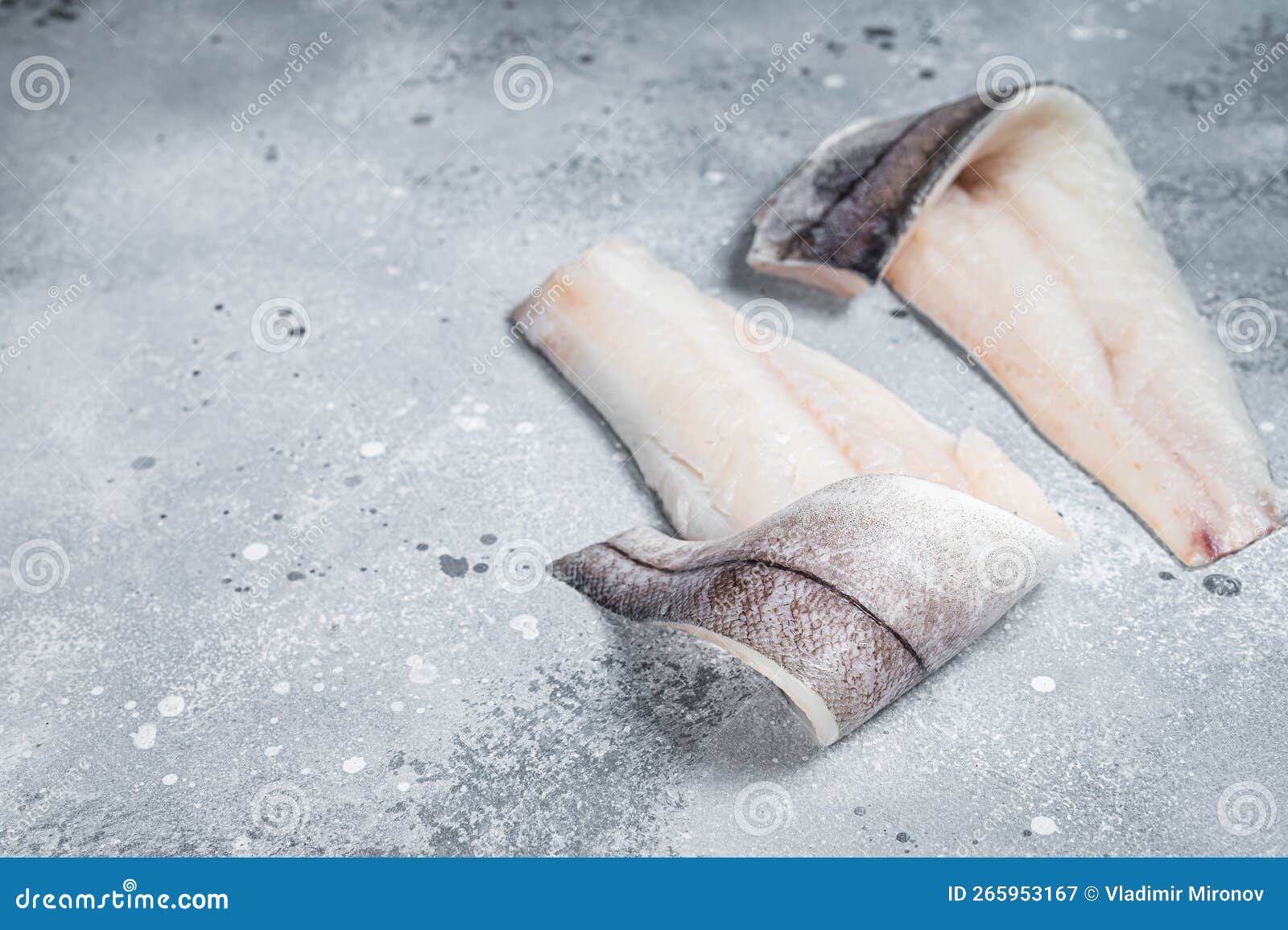 Two Raw Haddock Fish Fillets on Kitchen Table. Gray Background. Top ...