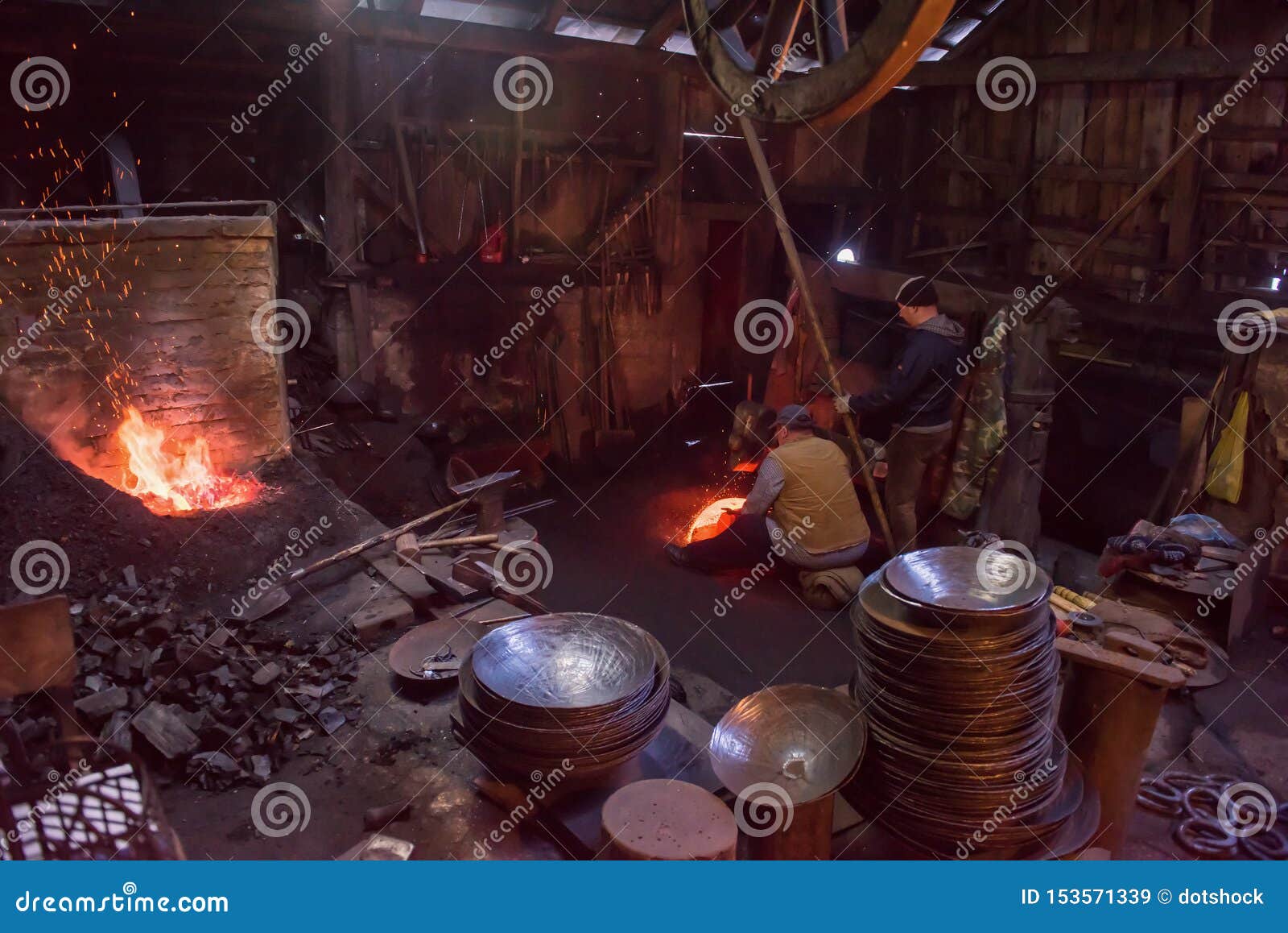 Blacksmith Workers Using Mechanical Hammer at Workshop Stock Image ...