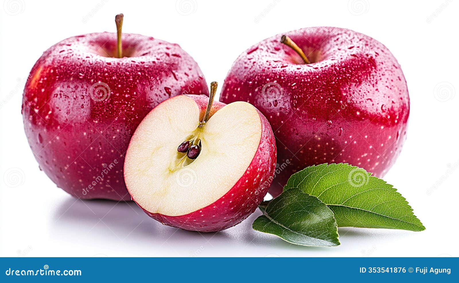 Two Red Apples with One Half Showing Seeds and Leaves on White ...