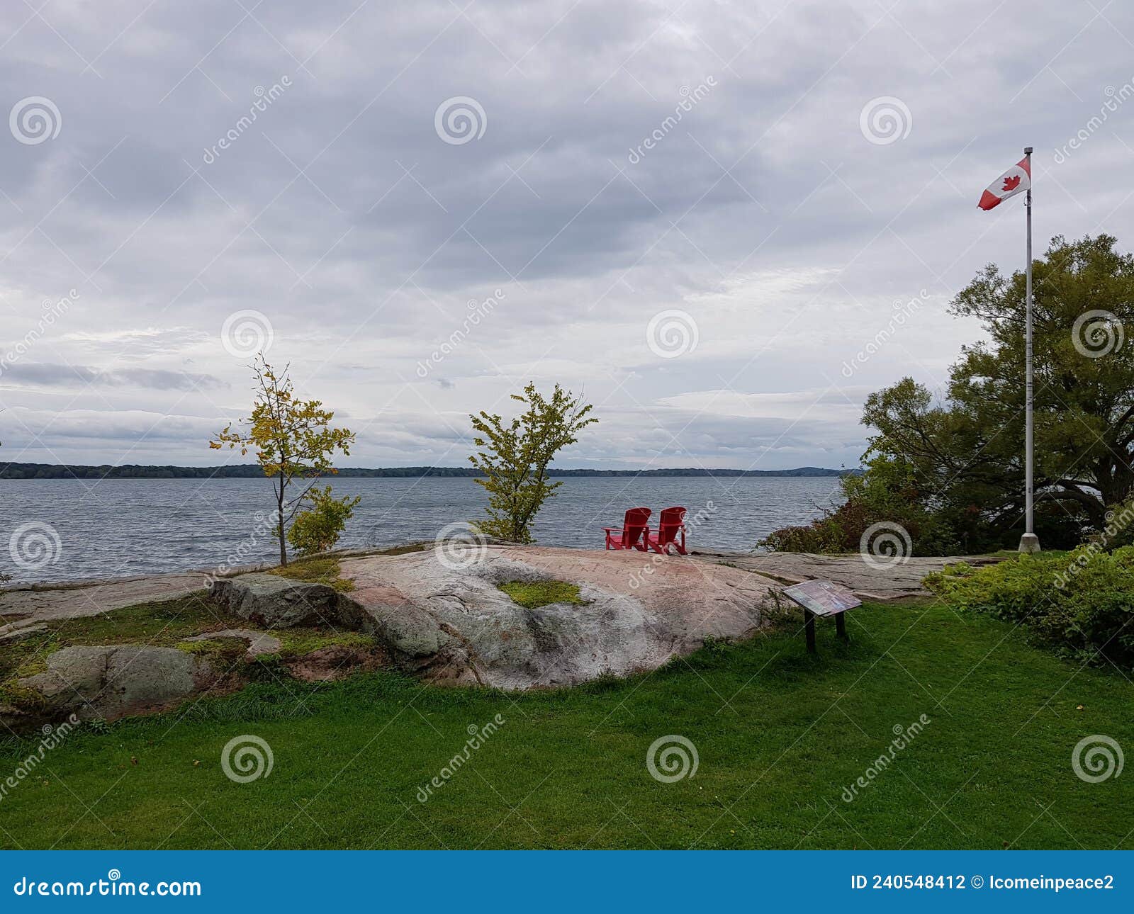 Two Red Beach Chairs, Lakeshore in Ontario Stock Photo - Image of ...