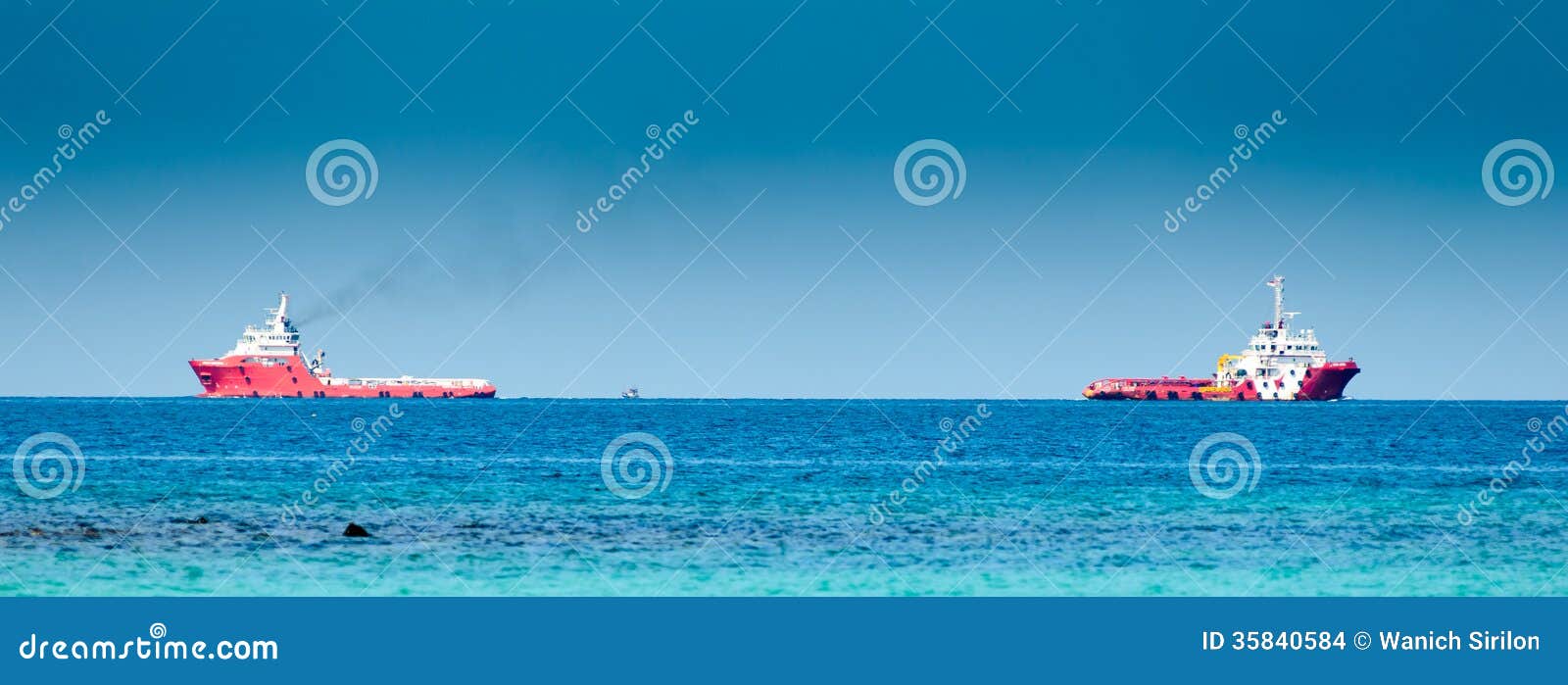 Two Red Cargo Ship on the Sea Stock Photo - Image of harbour, carrier ...