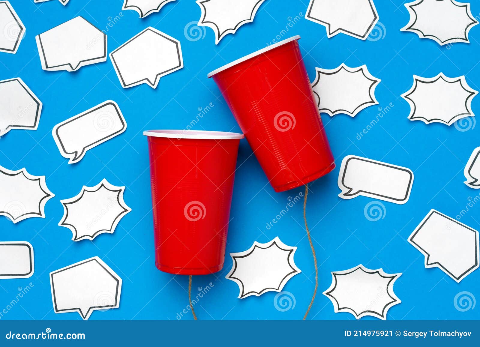 Two Red Cups Connected with a Thread with Speech Bubbles on Blue ...