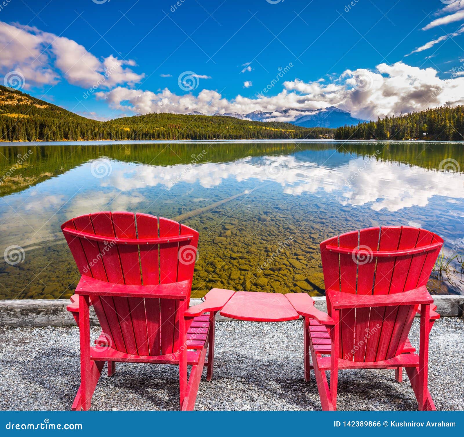Two Red Deck Chairs To Tourists Stock Photo - Image of chaise, canada ...