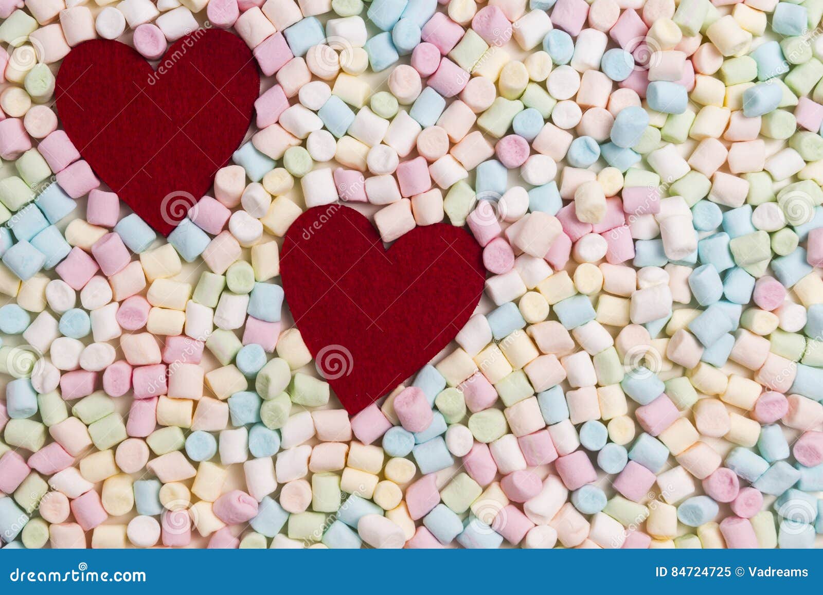 Two Red Hearts on Colorful Mini Marshmallows Background Stock Image ...