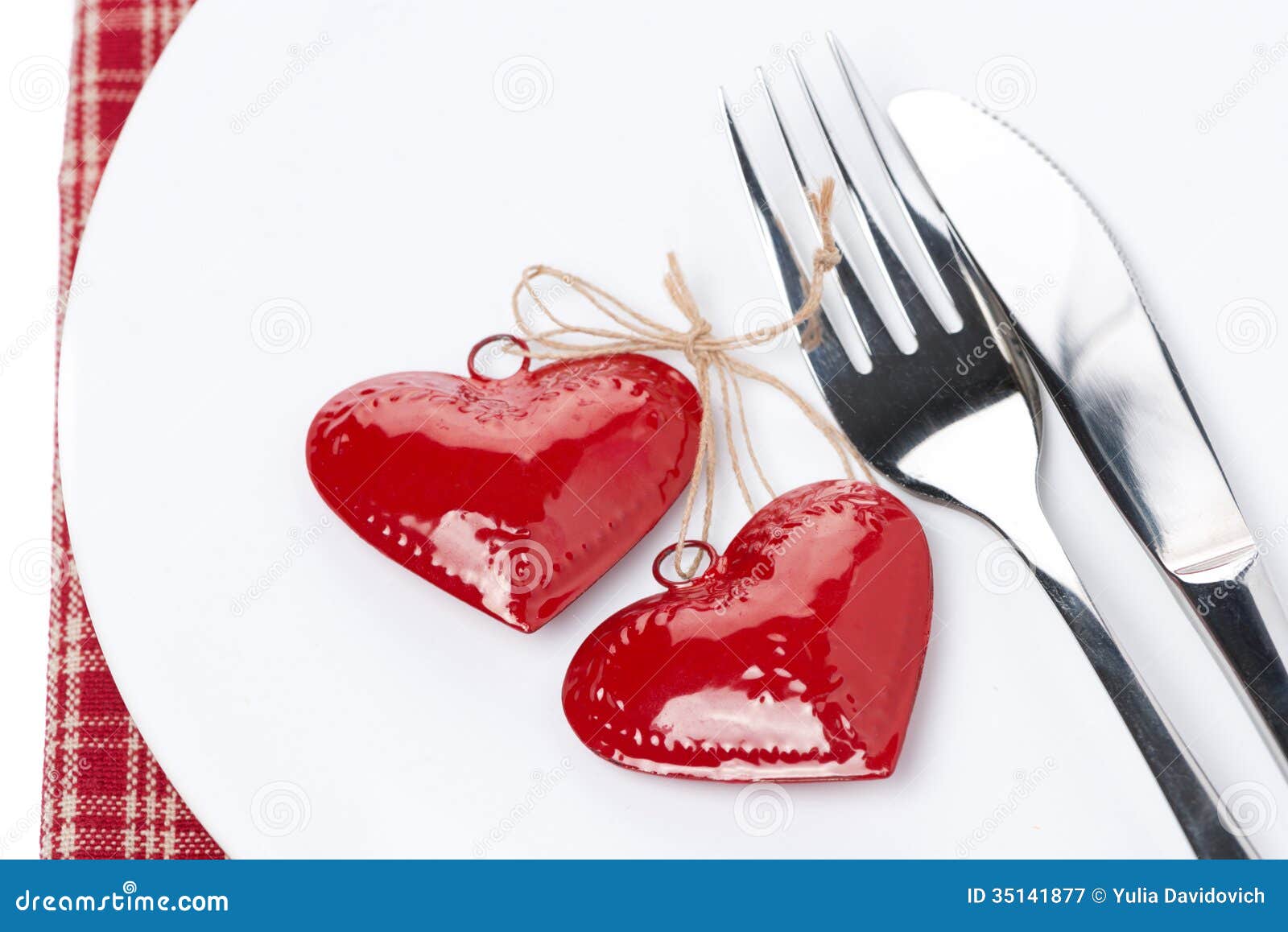 Two Red Hearts, Fork and Knife on a White Plate, Selective Focus Stock ...