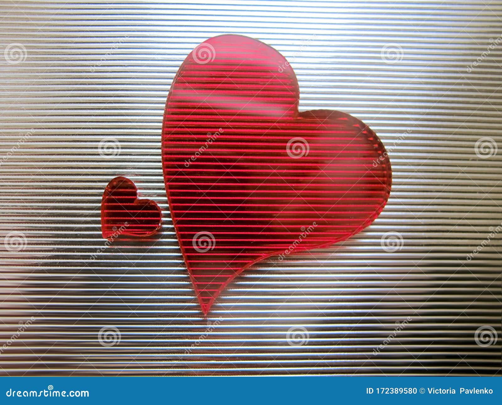 Two Red Hearts on a Silver Embossed Background Stock Photo - Image of ...
