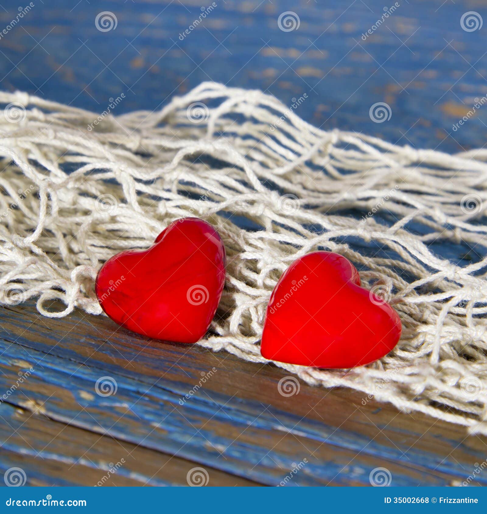 Two Red Hearts and String on Blue Wooden Surface. Stock Photo - Image ...
