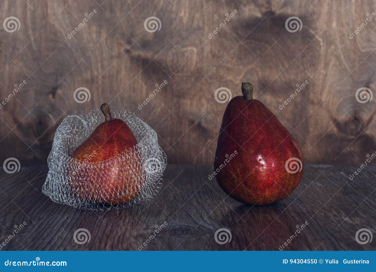 Two Red Pears on a Wooden Table, One Pear in a Grid. Stock Photo ...