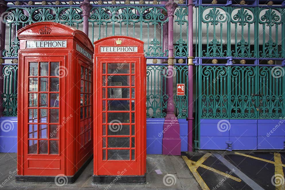 Two red phones stock photo. Image of symbol, buildings - 698500