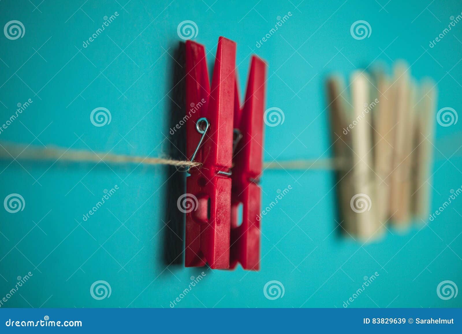 Two red pins on the rope. stock image. Image of clip - 83829639
