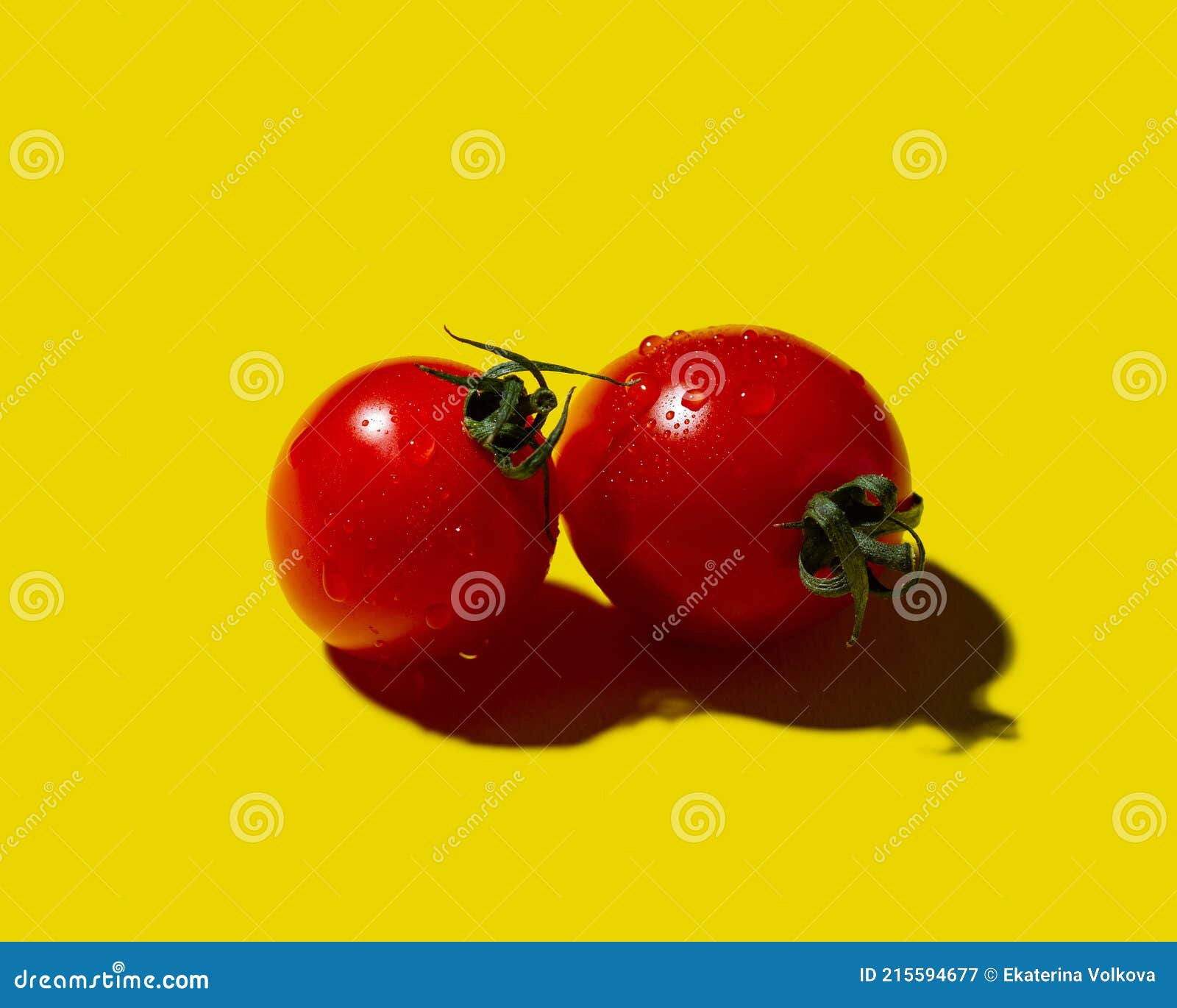 Two Red Tomatoes on a Yellow Background, Bright Light Stock Image ...