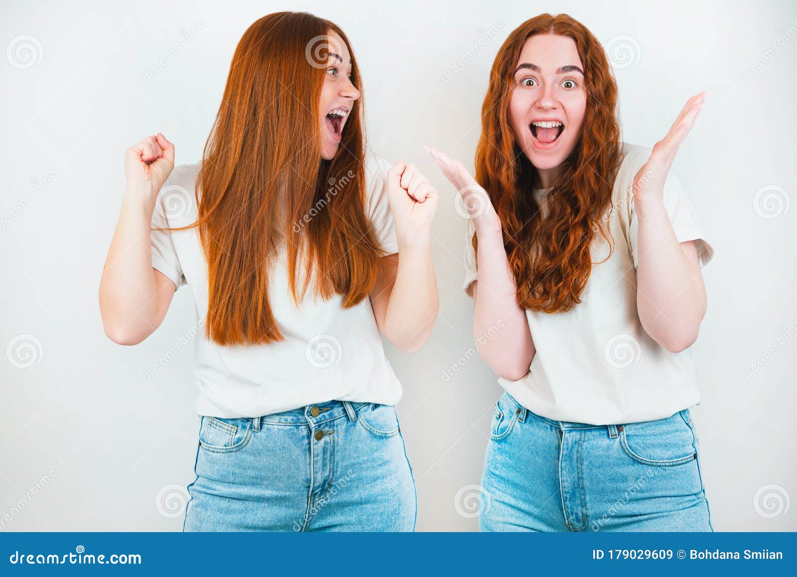 Two Redheaded Young Women Both Looking Happy Expressing Positive