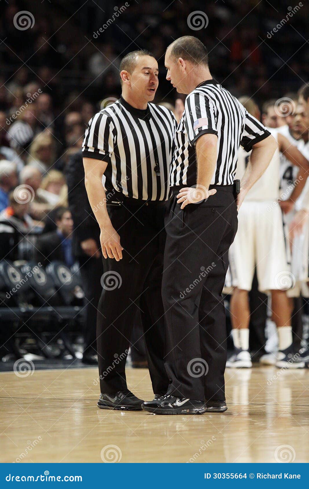 Two Referees Discuss a Call during a Game Editorial Stock Image - Image ...