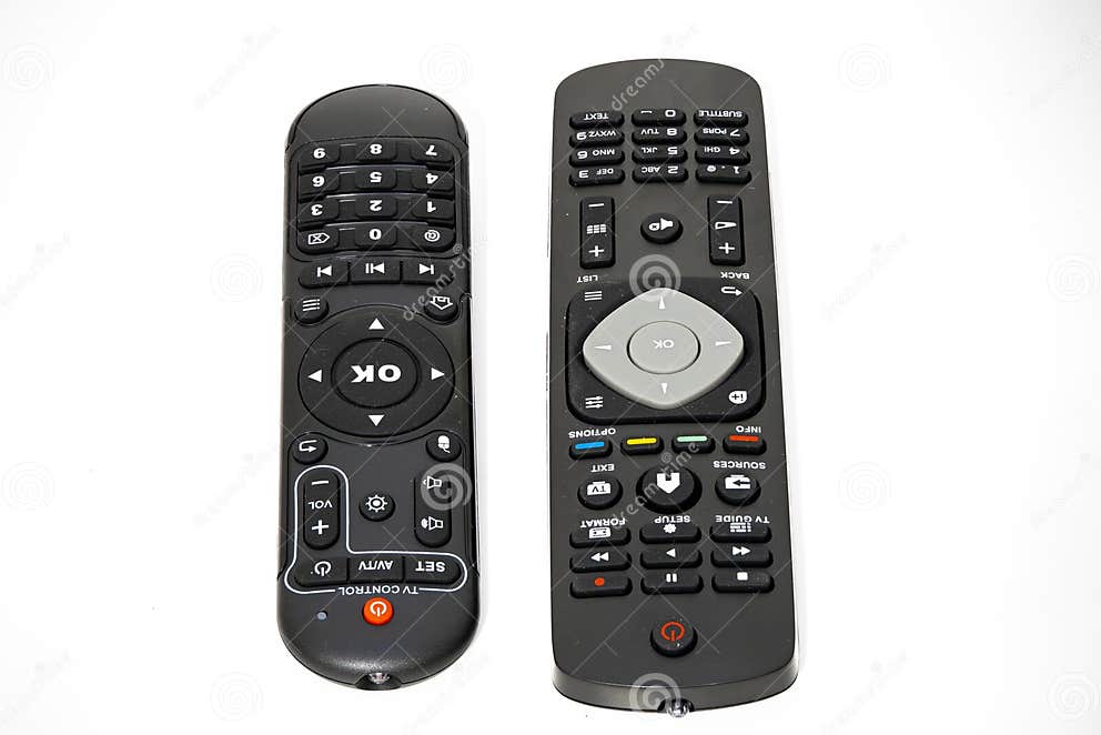 Two Remote Controls for Home Entertainment Devices on a White ...