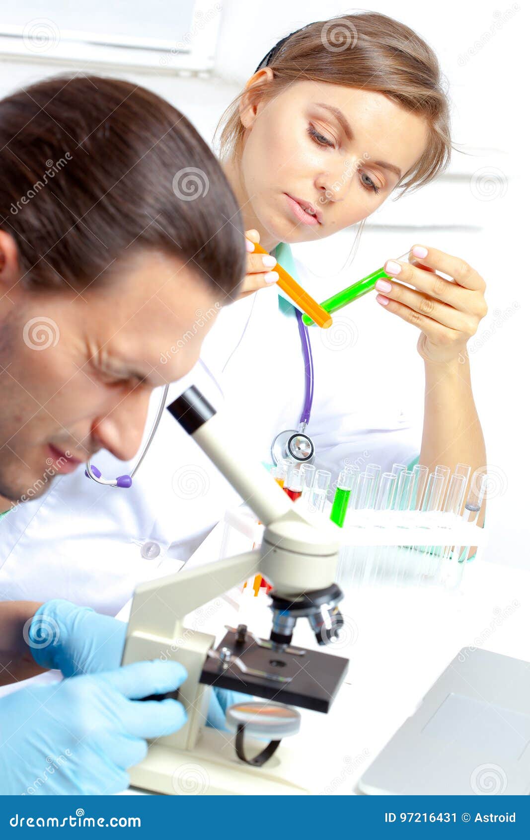 Two researchers in the lab stock image. Image of colleague - 97216431