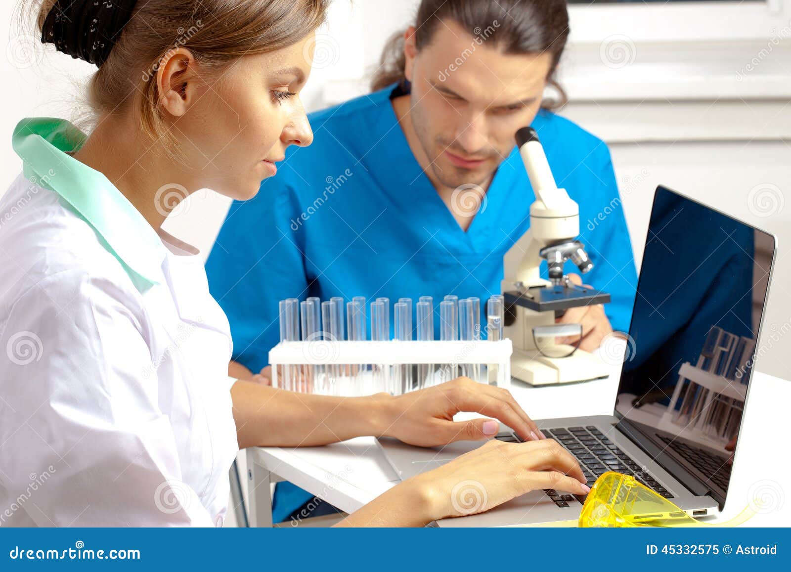 Two Researchers in the Laboratory Stock Image - Image of microscope ...