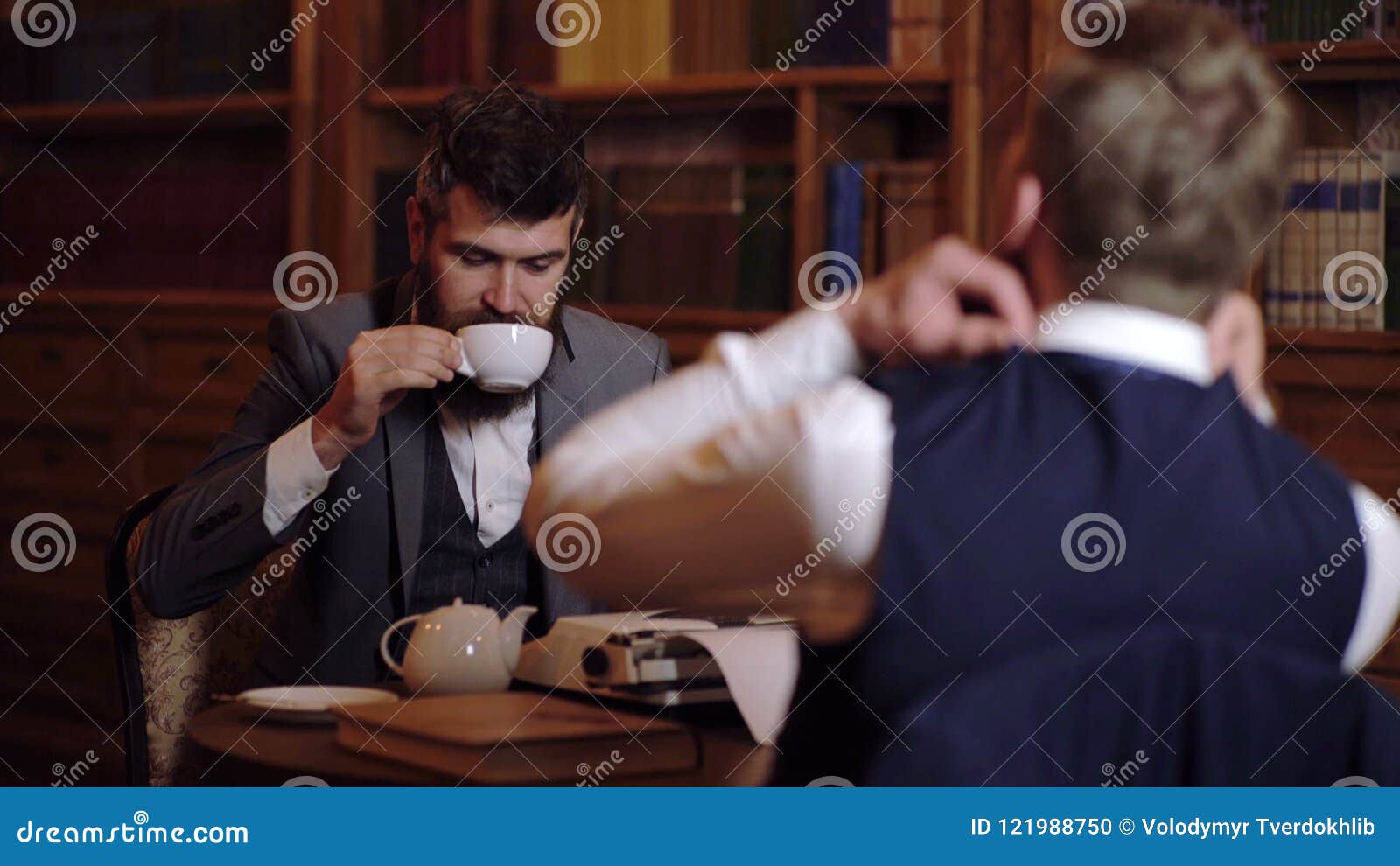 Two Respectable and Intelligent Men Communicate in the Library. the ...