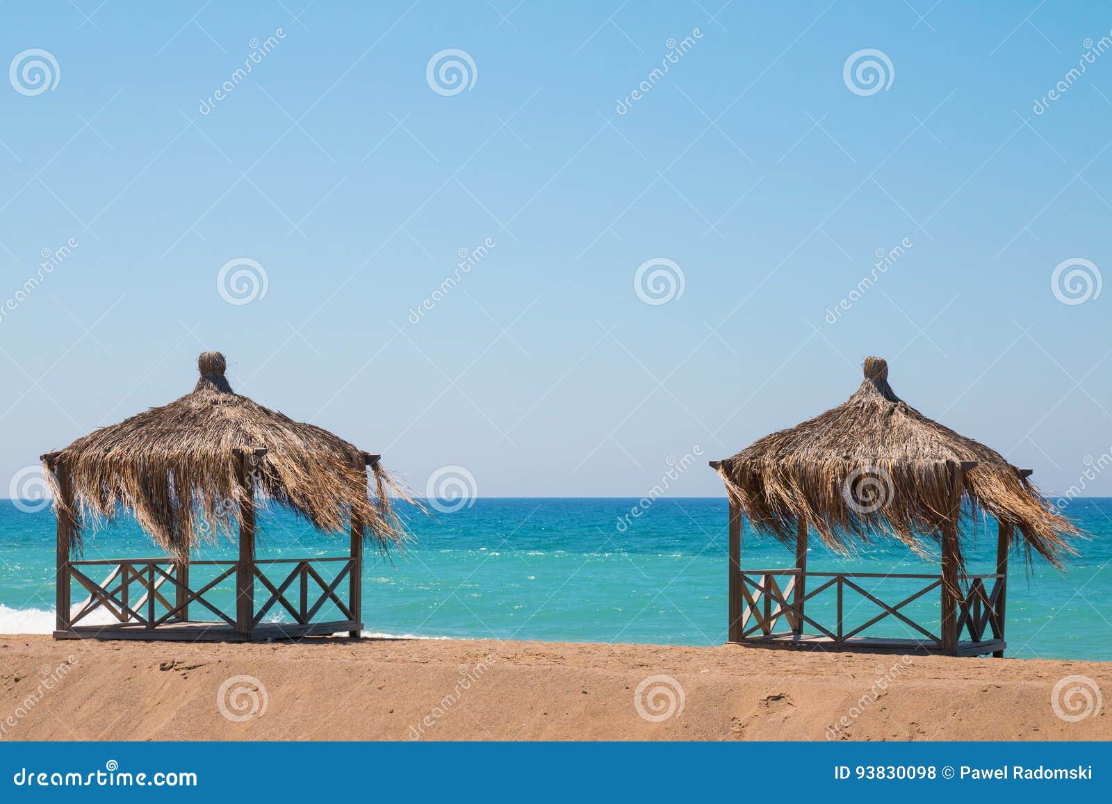 Two Rest Shacks on Tropical Beach on the Shore of the Ocean Stock Photo ...