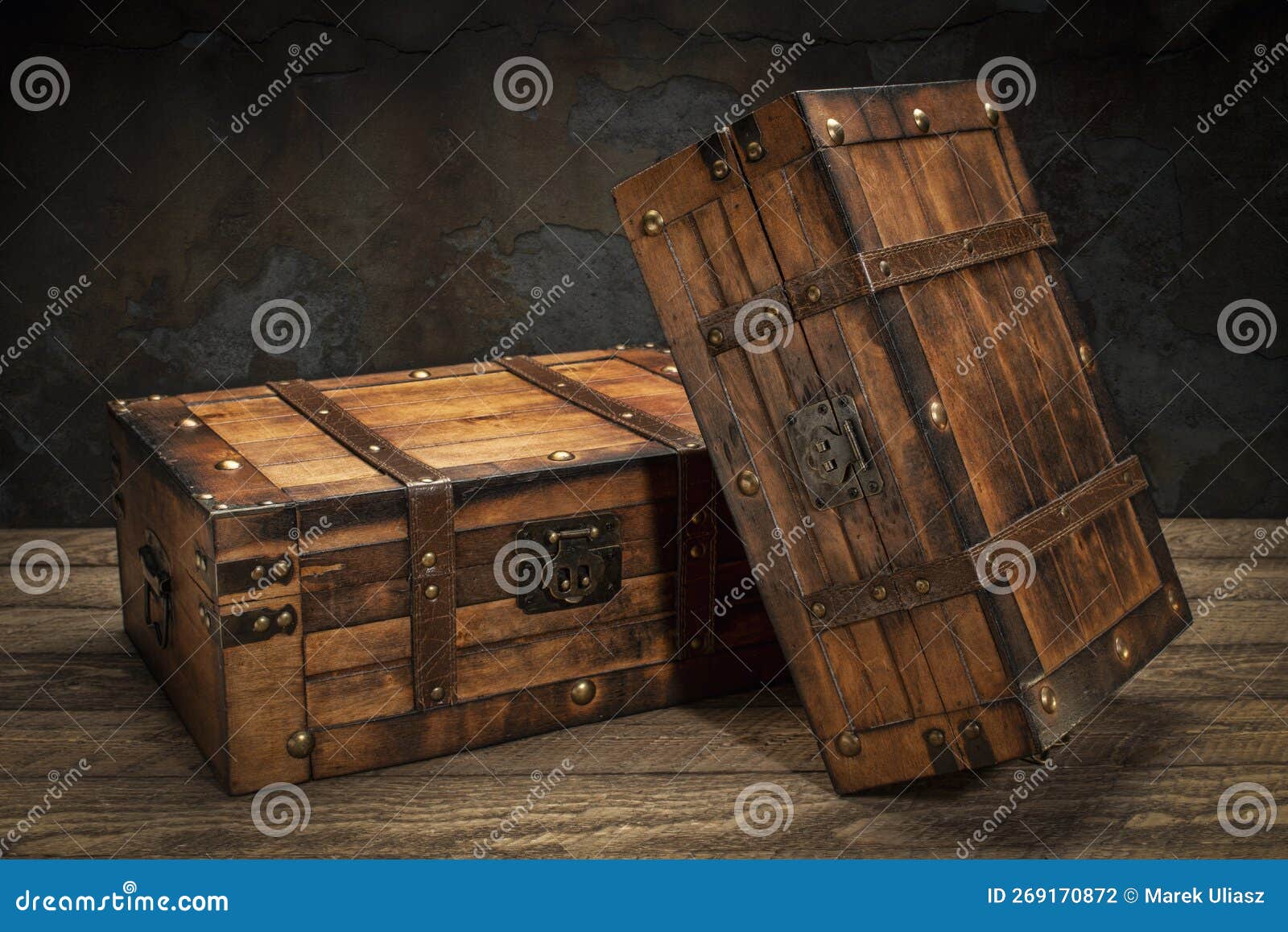 Two Retro Decorative Cases or Storage Boxes on a Rustic Table Stock ...