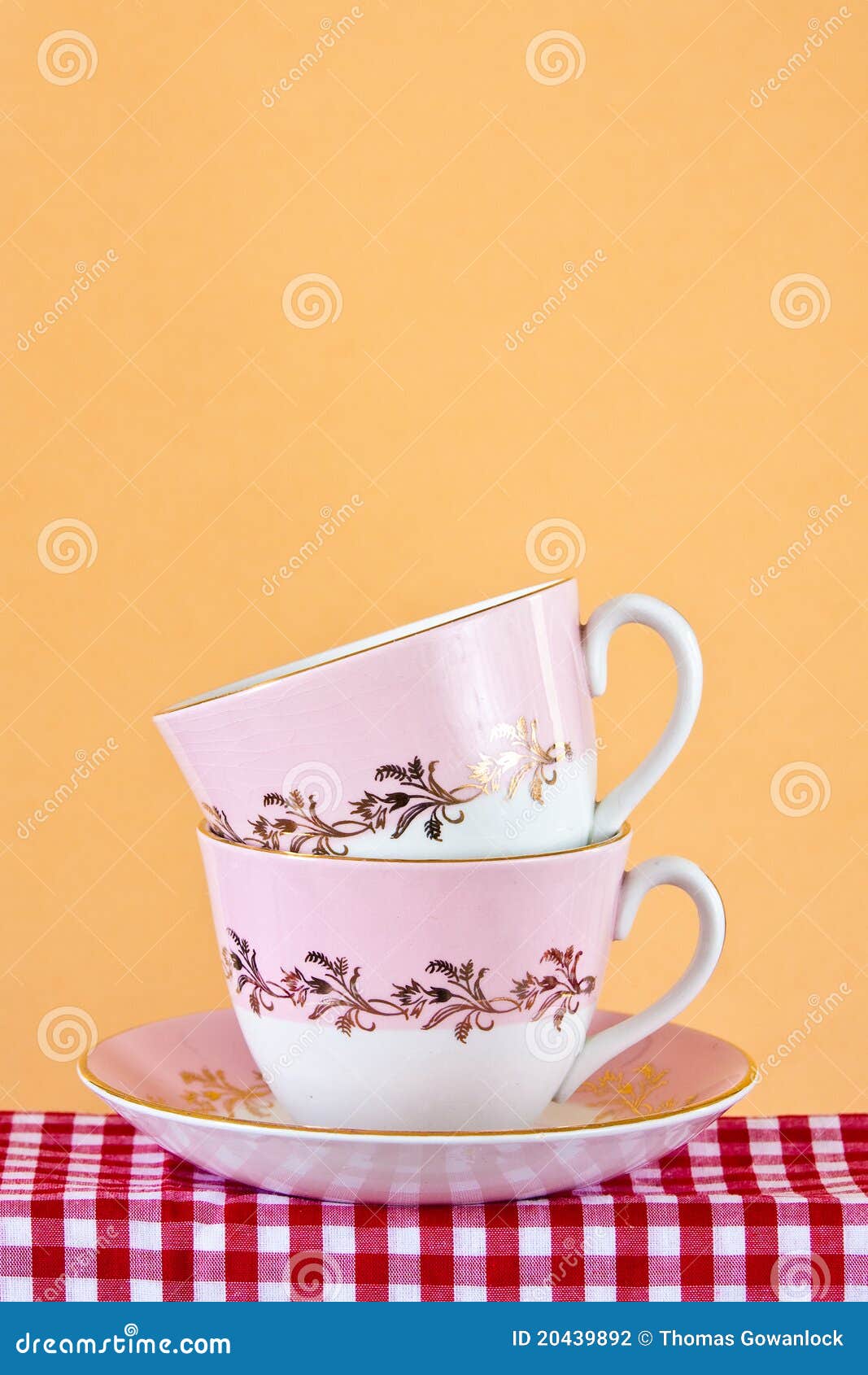 Two retro style teacups stock photo. Image of table, gingham - 20439892