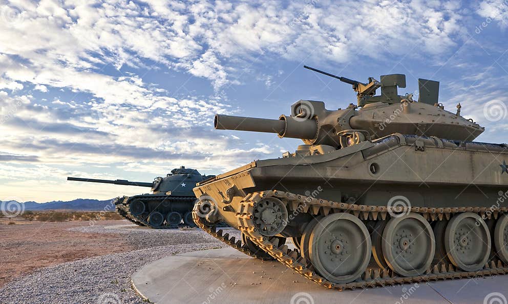Two Retro Tanks at Sunrise stock photo. Image of front - 17580242