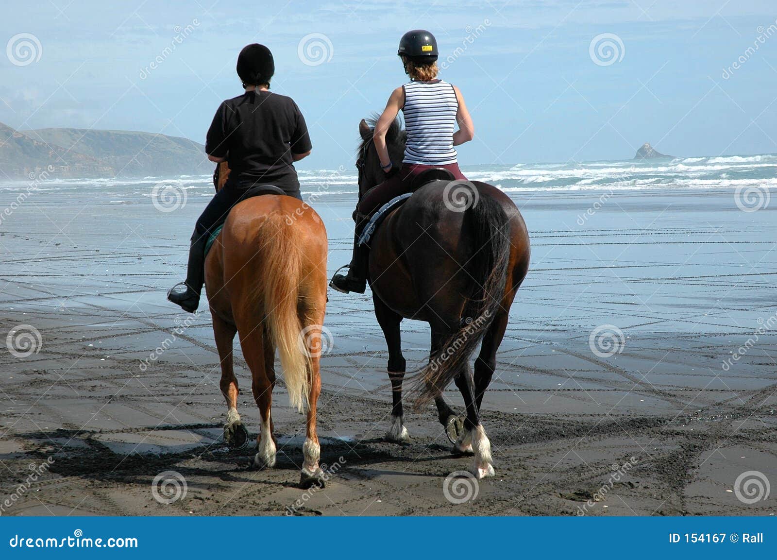 Two Riders stock image. Image of play, water, sand, health - 154167