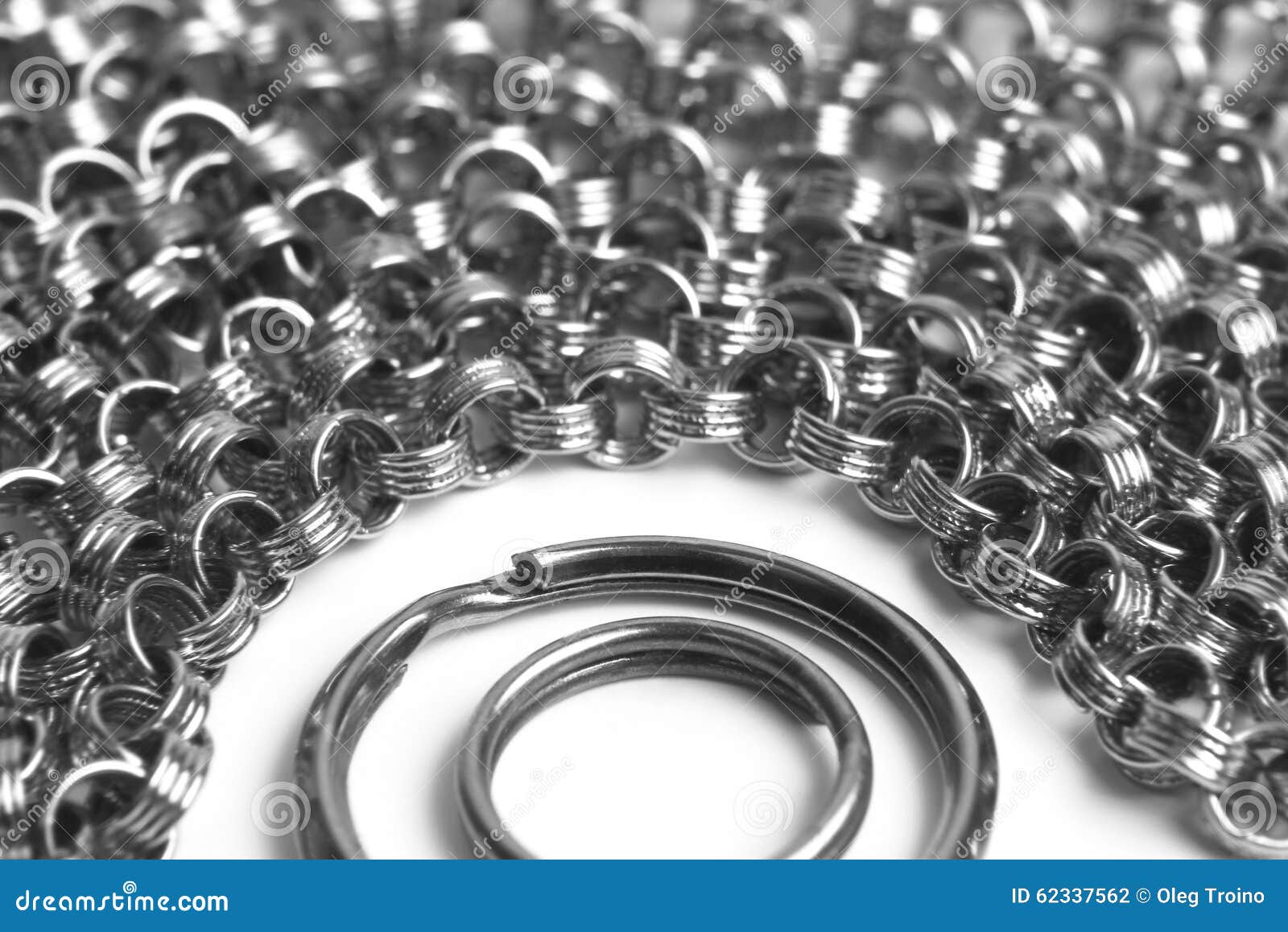 Two Rings Surrounded by a Large Number of Chains Stock Photo - Image of ...