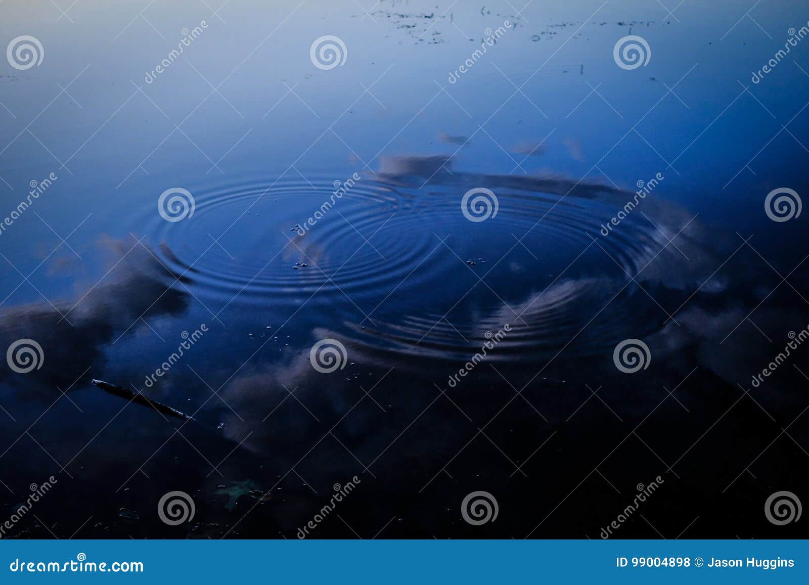 Two Ripples in a Blue Sky Lake Stock Photo - Image of splash, droplet ...