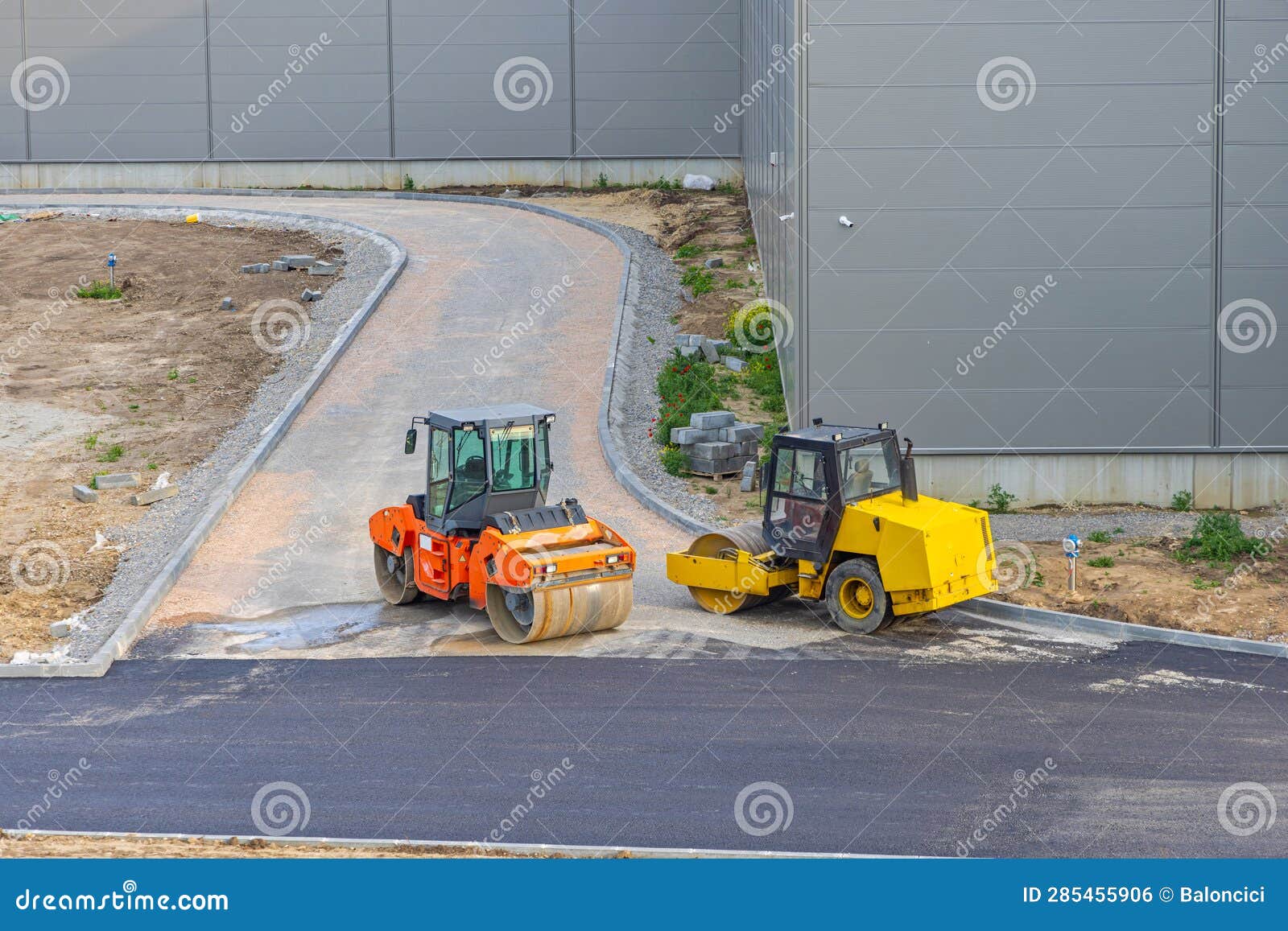 Two Rollers Construction Site Stock Photo - Image of building, company ...