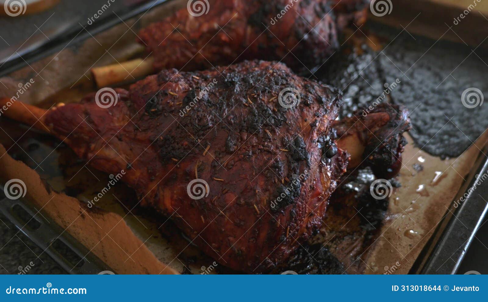 Two Roasted Mutton Lamb Leg Covered with Baking Paper on Baking Tray ...