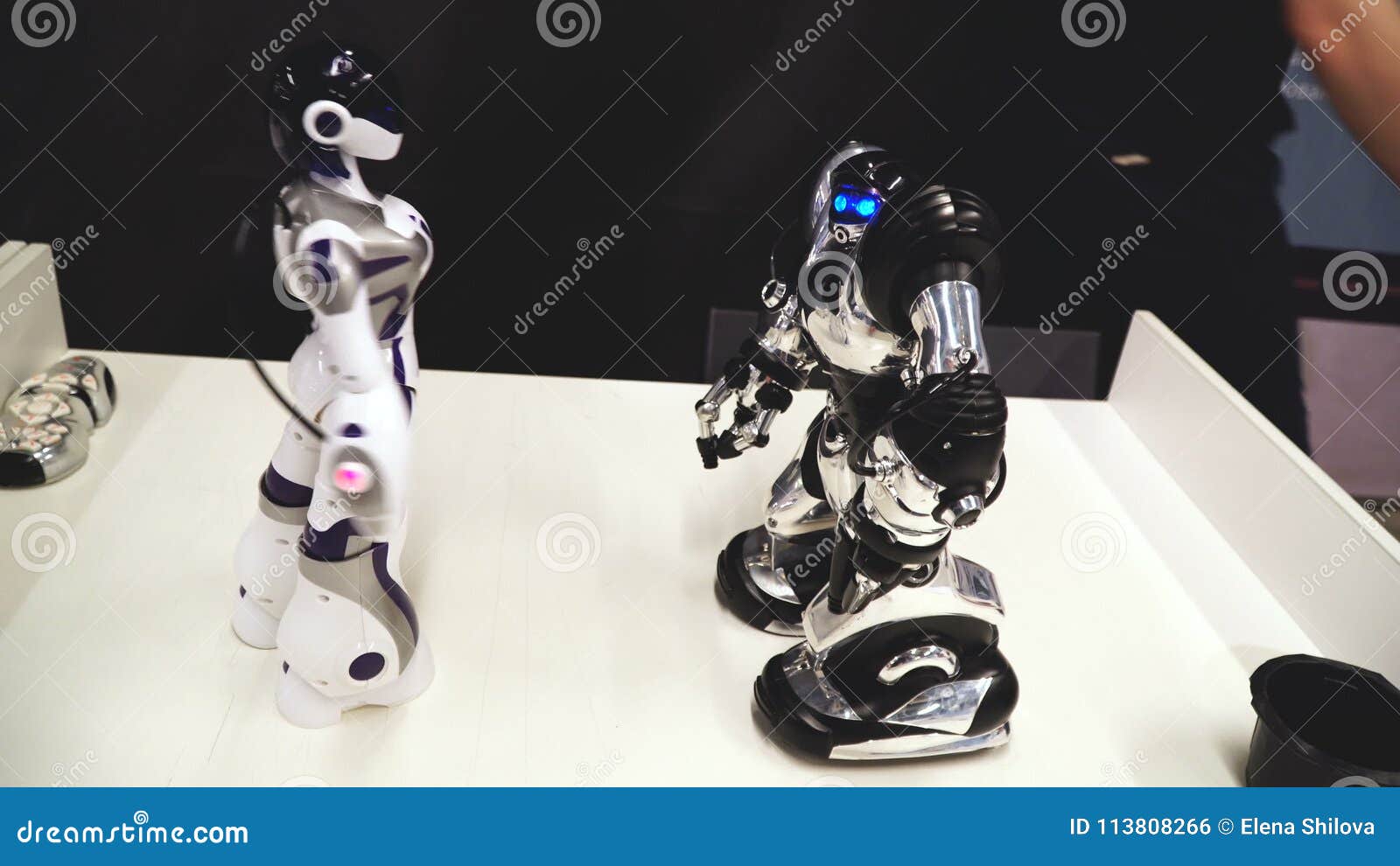 Two Robots Dancing. Smart Robotic Technology. Closeup of Smart Robots ...