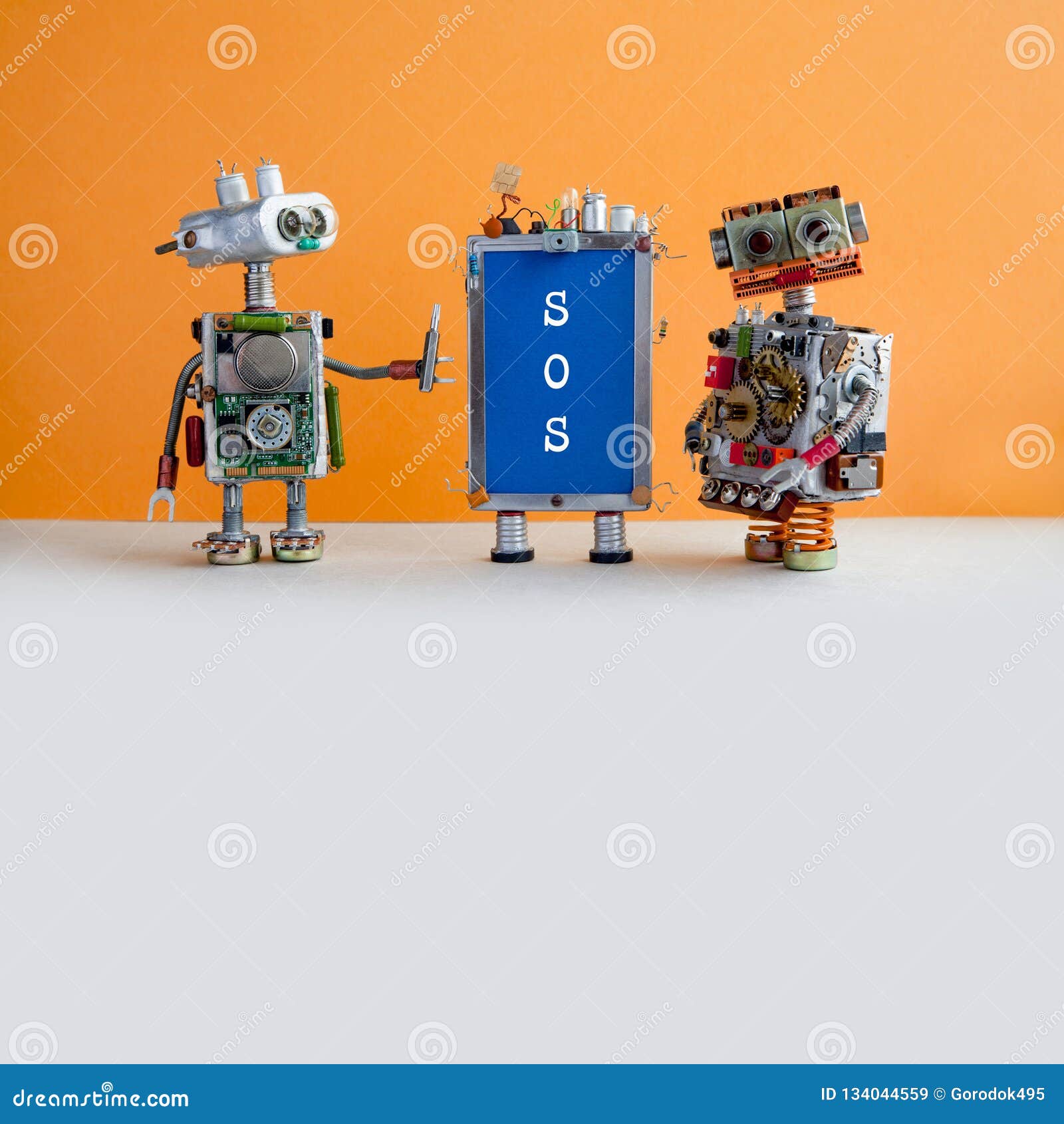 Two Robots Handymans and Smartphone with Message SOS on Blue Screen ...