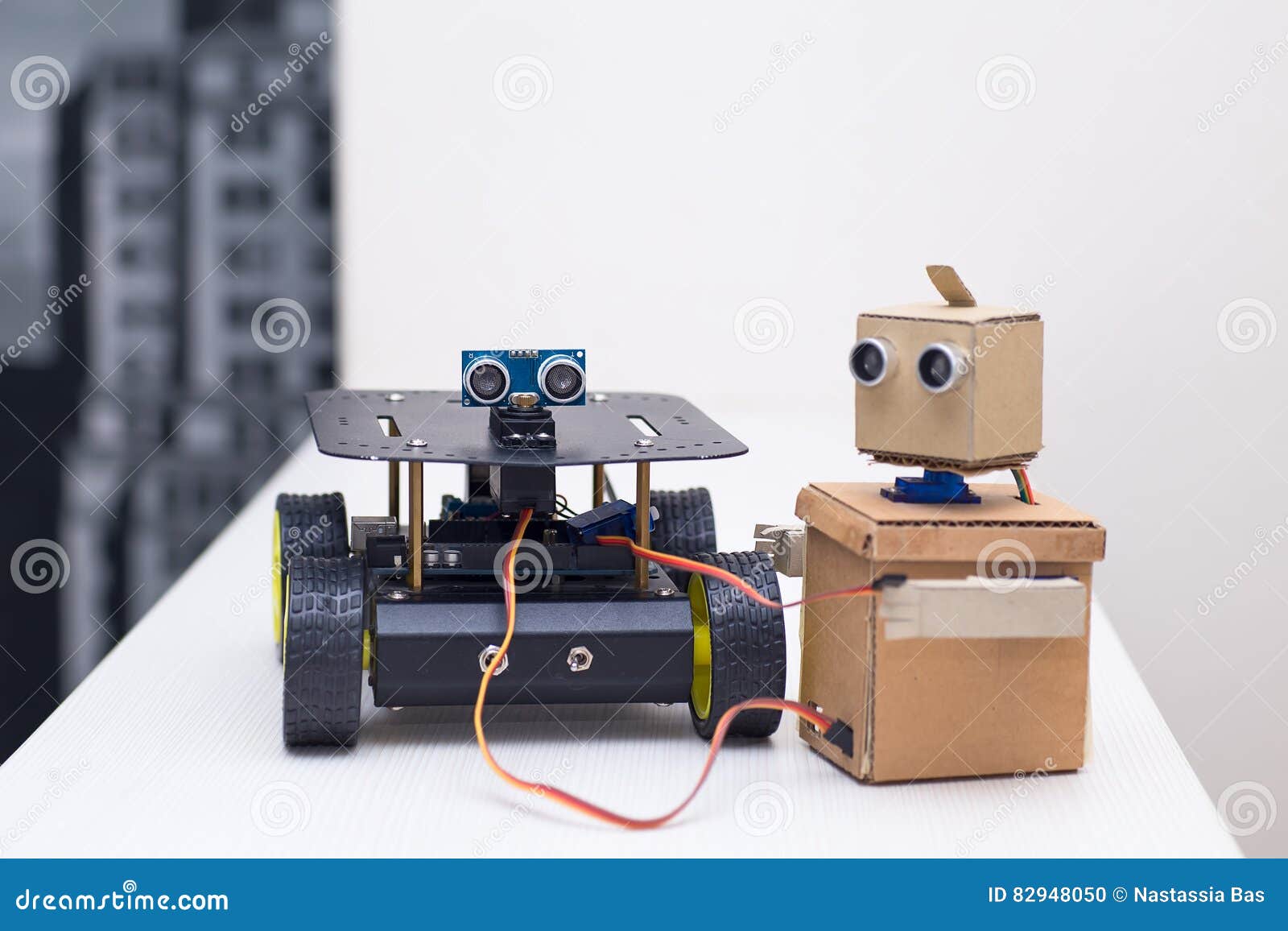 Two Robots are on the Table at Home Stock Photo - Image of control ...