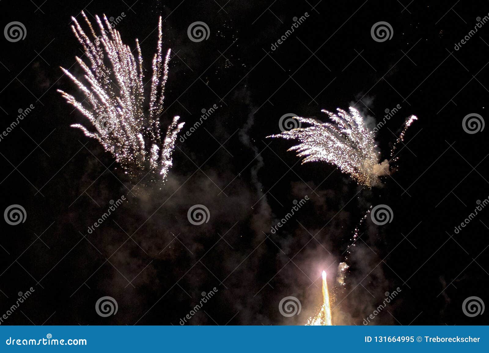 Two Rocket Fans at the Fireworks Stock Image - Image of happy, burst ...
