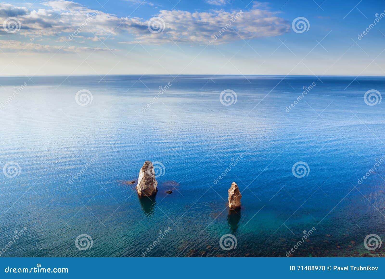 Two rocks facing the sea stock photo. Image of sunrise - 71488978