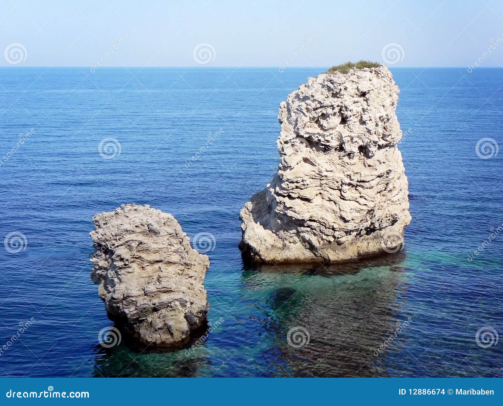 Two rocks at the sea stock photo. Image of giant, uninhabited - 12886674