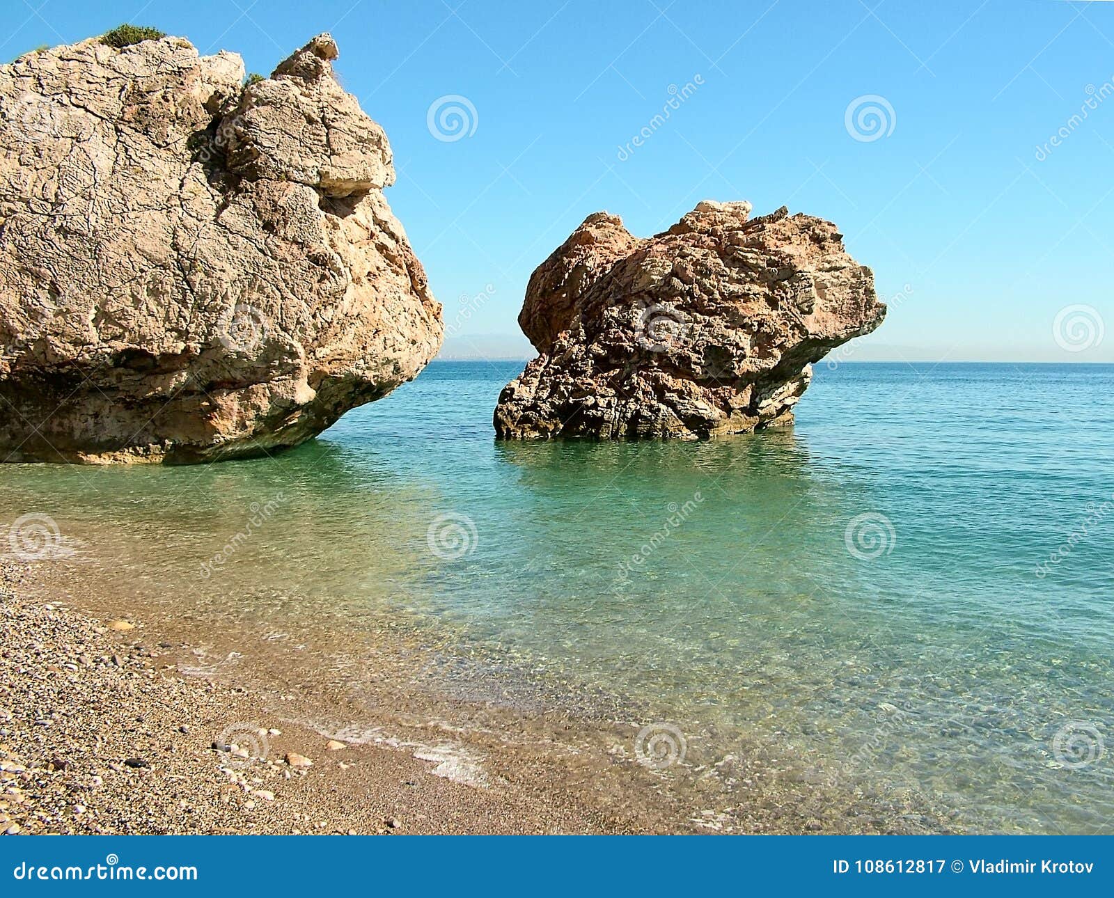 Two rocks in the sea stock image. Image of color, azure - 108612817